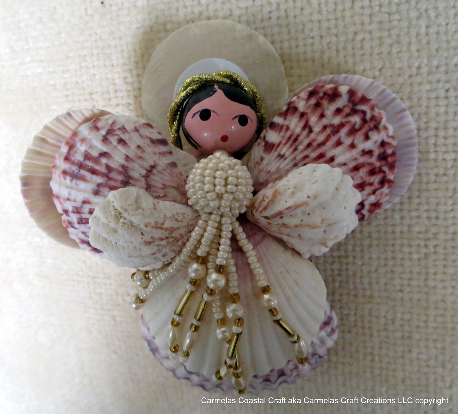 sea shell angel with dangling pearls