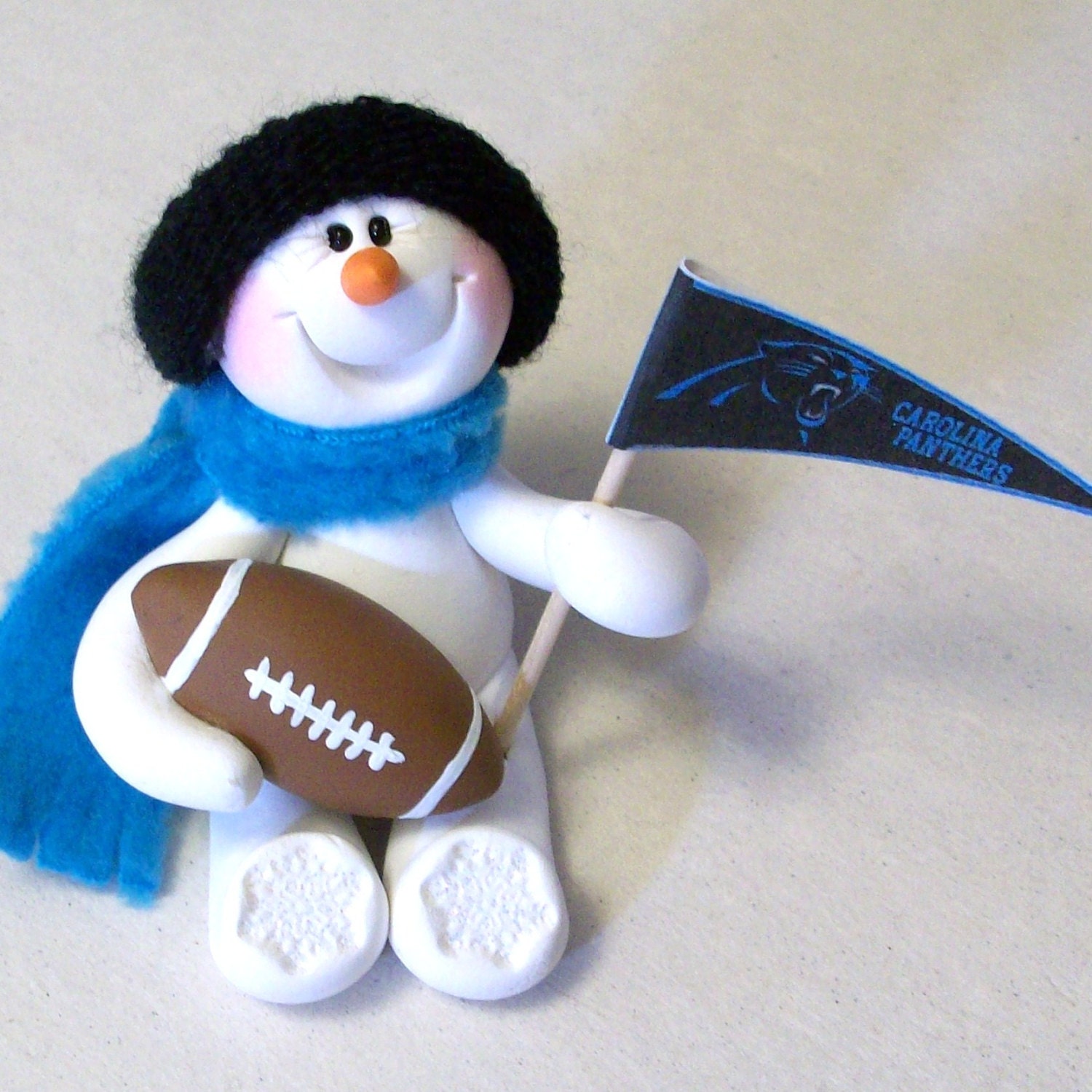 Carolina Panthers football snowman ornament by Peggers on Etsy