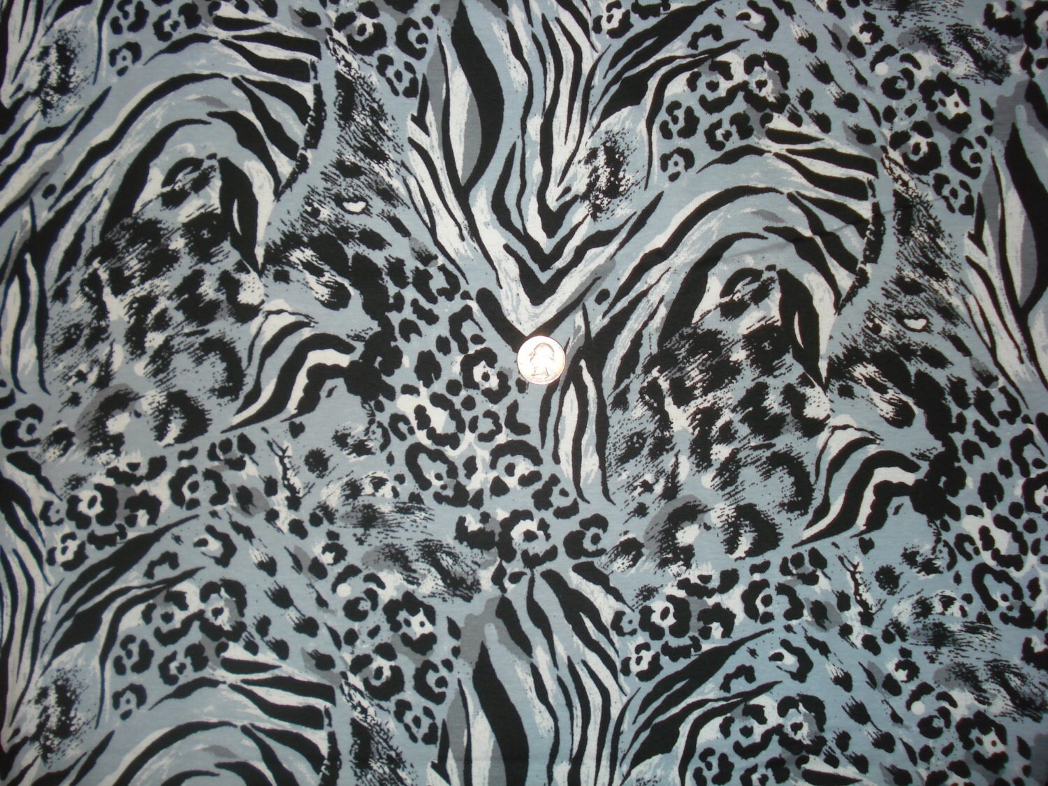 Black and grey animal print on cotton rib knit fabric by nrfabrics