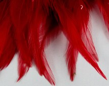 Unique red feathers related items | Etsy