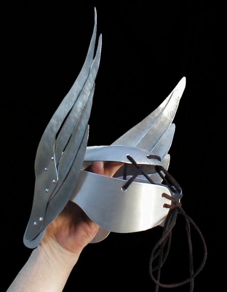 Thor Styled Metal Helmet with adjustable tie back by brooksbot75