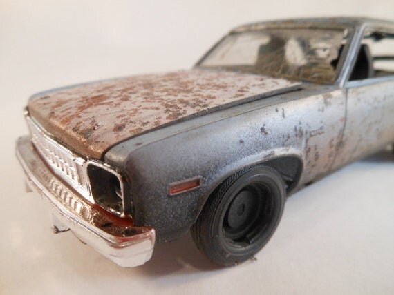 Rusted and wrecked 1970s Chevy nova 1/24 scale model car in