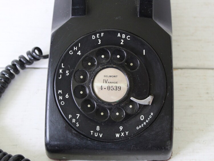 vintage 1950s rotary dial telephone. Black by Luncheonettevintage