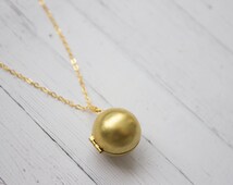 Unique sphere locket related items | Etsy