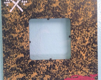 Red race car and checkered flag picture frame with protective plastic cover