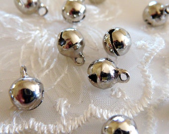 Tiny bell charm | Etsy