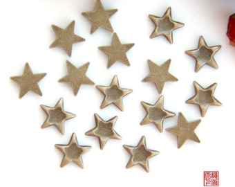 Popular items for small brass stars on Etsy