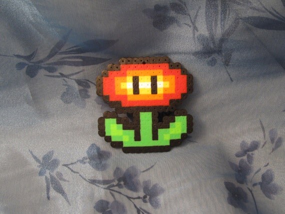 Fire Flower Pixel Art Super Mario Bros. magnet by emmadreamstar