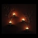 Set of two candle metal tree sculpture wall sconces for