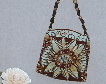 Hand beaded and embroidered handbag in chocolate brown and gold kitenge ...