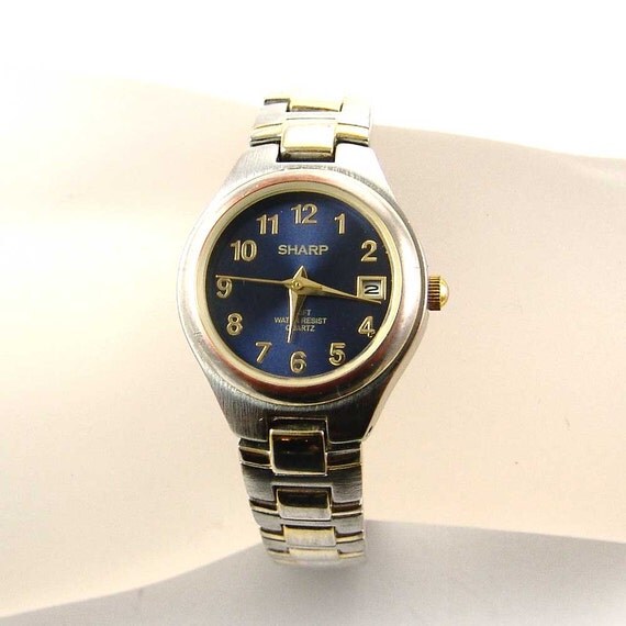 Vintage Sharp Quartz Ladies Wristwatch With Date 100 ft Water