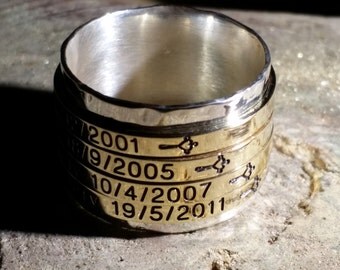 Spinner ring. Sterling silver ring with 4 custom engraved spinners ...