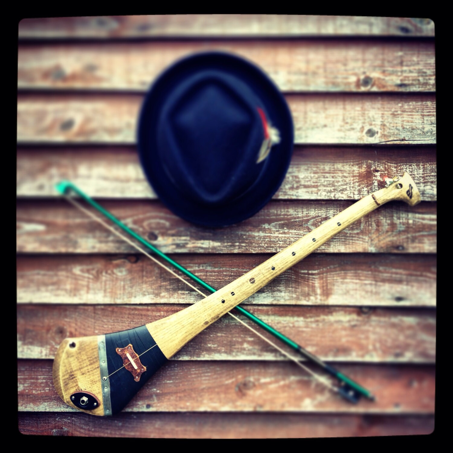 One-string electric fiddle/ diddley bow by DaShtick. CBG.