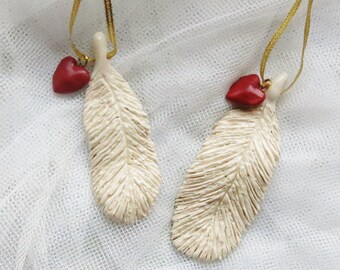 Angel feather | Etsy