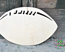 Popular items for wooden football on Etsy