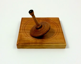 Wooden spinning top | Etsy