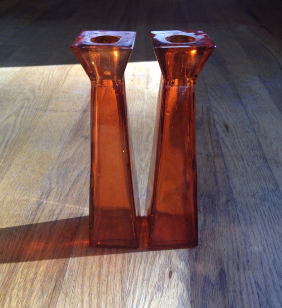 Items similar to Vintage orange glass candlesticks on Etsy