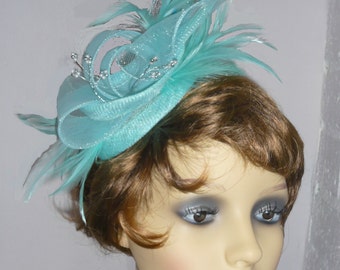 Popular items for aqua fascinator on Etsy