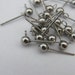 20 Earring posts with loops and stoppers 16 x 7mm stainless