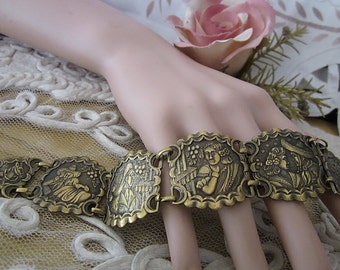 Embossed bracelet | Etsy