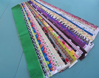 Jelly Roll Fabric Designs with Two Free Strips