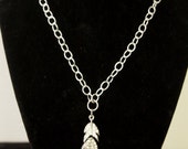 Items similar to Sparkle Feather Necklace on Etsy