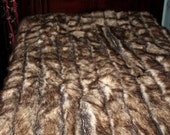 COVERING THE WORLD ONE THROW AT A TIME FUR by BedspreadsAndThrows