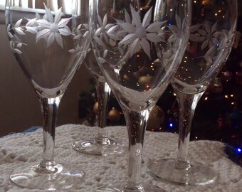 Four charming vintage wine glasses in a lovely floral cut glass pattern