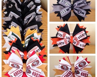 Popular items for team hair bows on Etsy