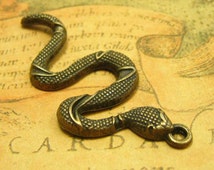 Popular items for serpent charm on Etsy