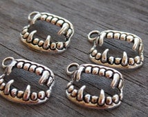 Popular items for silver fangs charm on Etsy