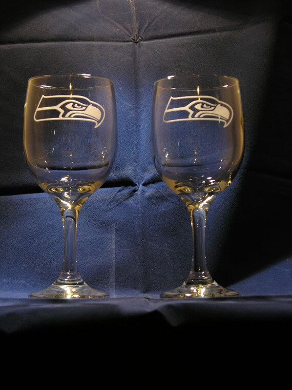 Items similar to Pair of Seattle Seahawks hand etched wine glasses Made ...