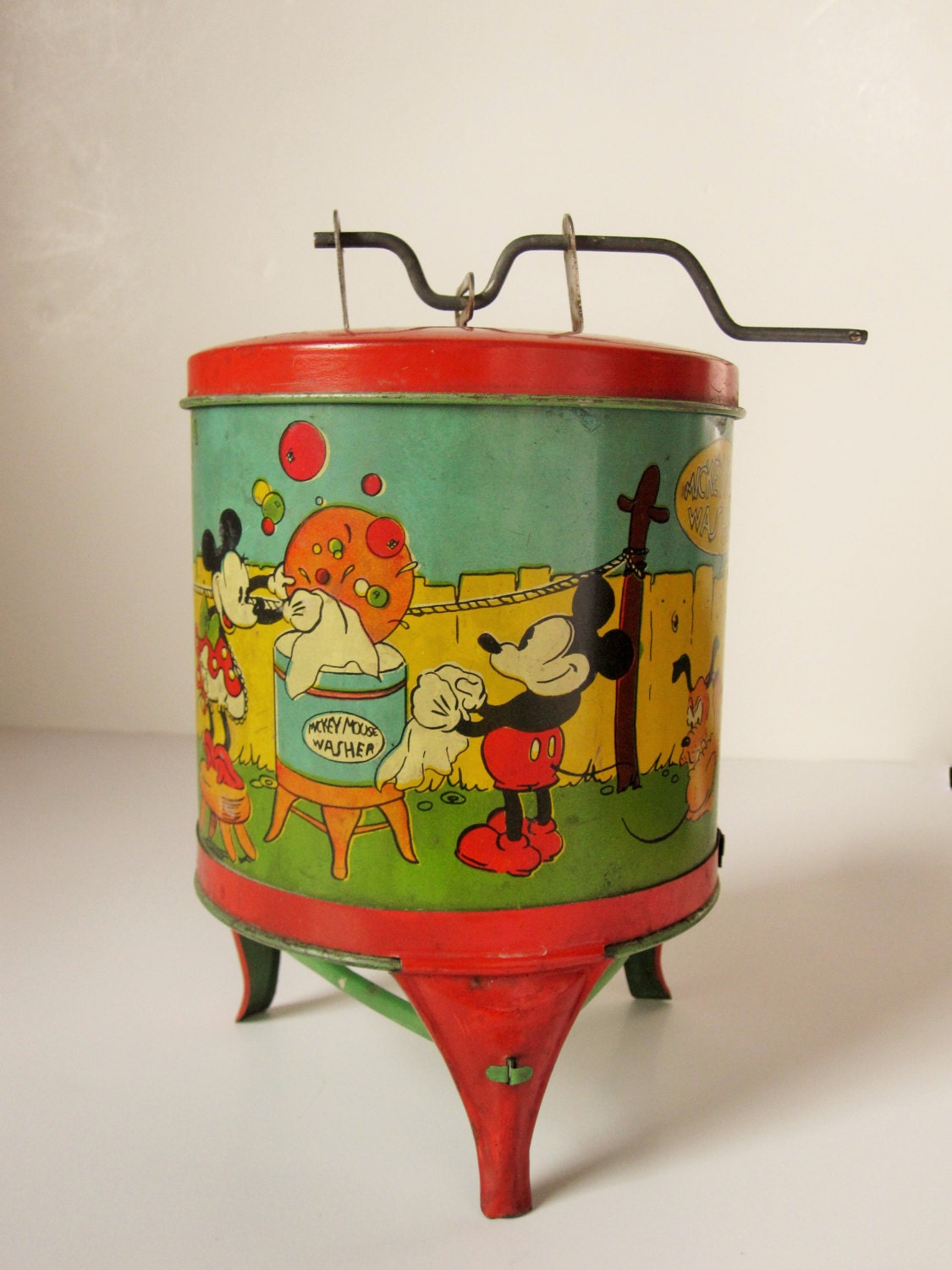 7" tin toy washing machine, featuring lithographed artwork of animated ...