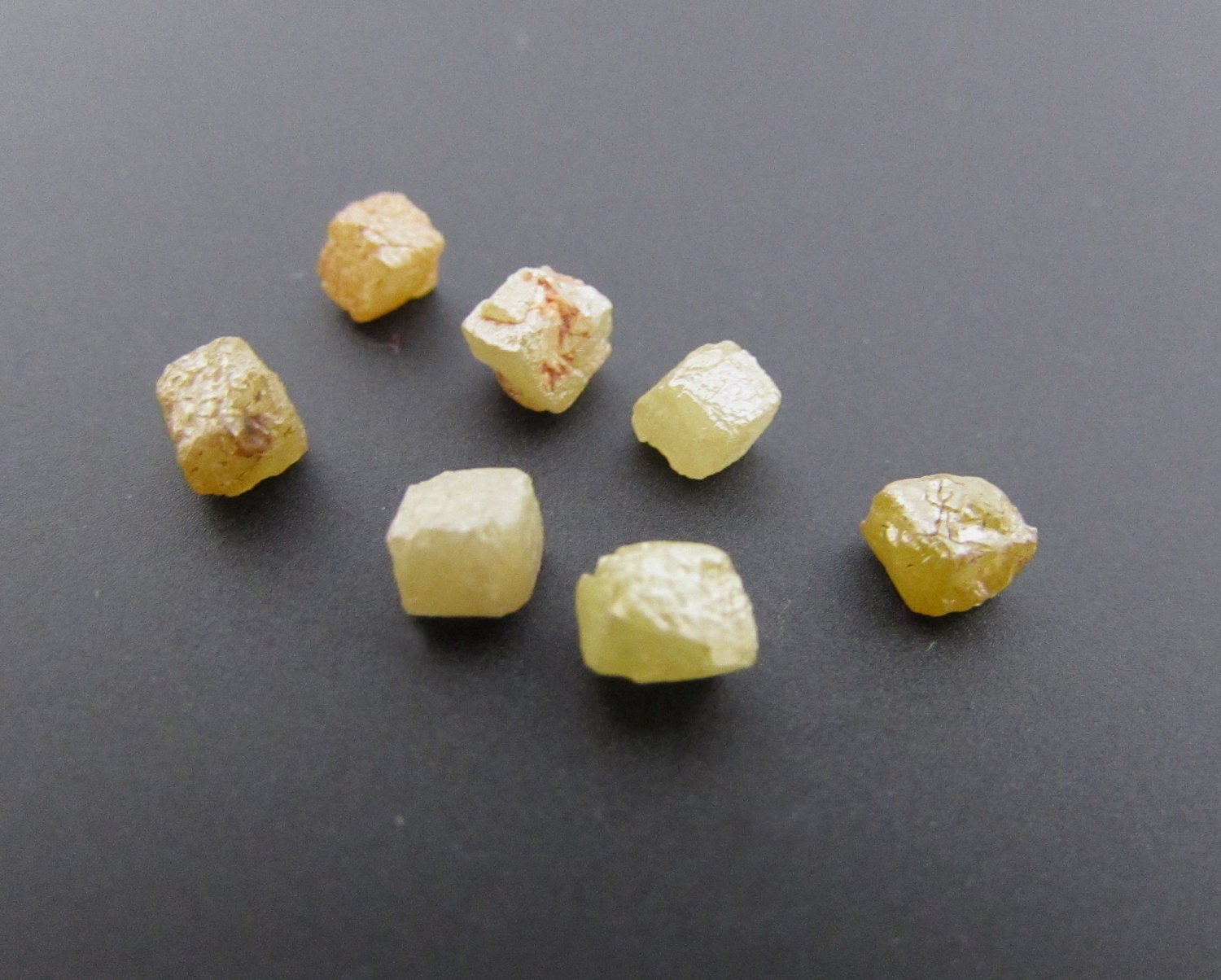 3.5 carat Lot of 7 yellow uncut diamonds, rough diamonds, raw diamonds ...