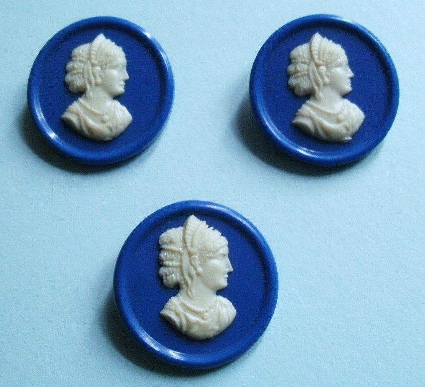 Cameo buttons, set of 3, blue resin with a white cameo escutcheon, the ...