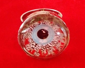 Popular items for bloodshot eye on Etsy