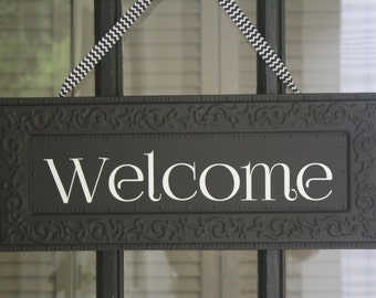 Metal welcome sign