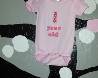 Birthday Baby Onesie. "1 year old" pink with pink polka dot number and ...
