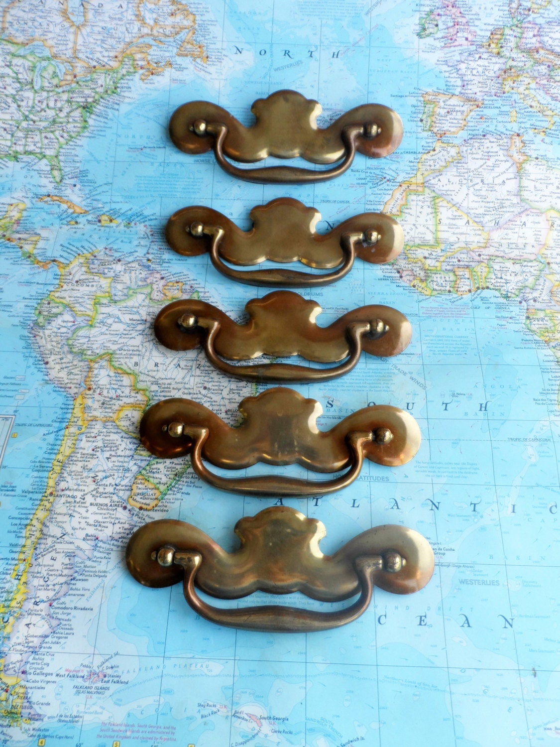 SALE! 5 vintage curvy shiny metal handles with brass pulls – Haute Juice