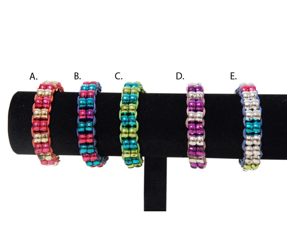 Items similar to Rainbow Loom Bracelets with Beads on Etsy