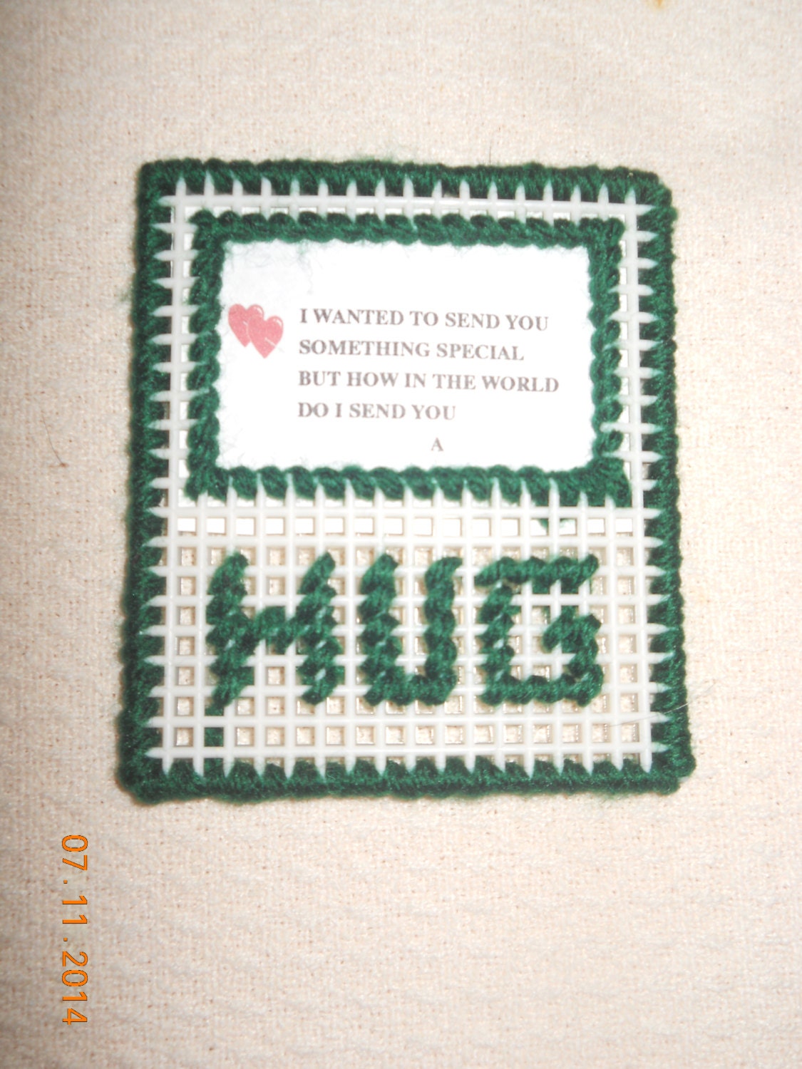 HUG Magnet in plastic canvas