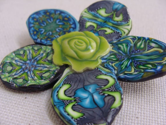 Items similar to Polymer Clay Flower Pin or Pendant on Etsy