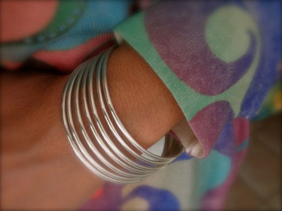 Set of 7 handmade sterling silver bangle bracelets