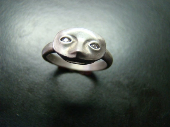 Unique Sterling SIlver Mask ring with genuine diamonds
