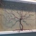 Wire tree sculpter framed in a shadow box