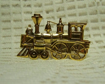 Gold steam train | Etsy