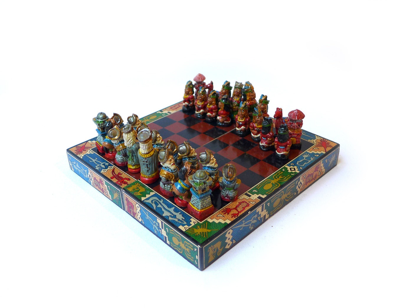 Vintage Peruvian clay figurine chess set Spanish versus Incas