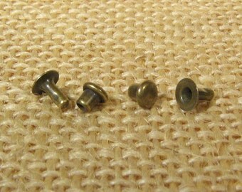 Antique brass rivets | Etsy