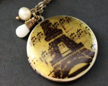 Popular items for eiffel tower locket on Etsy