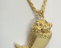 Unique saber tooth necklace related items | Etsy